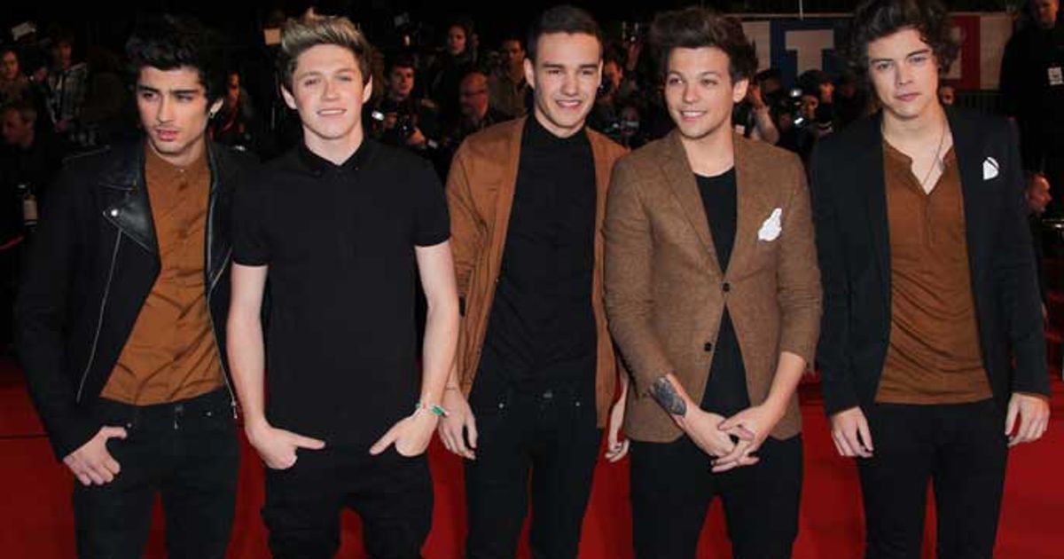 Writing credits and a perfume: One Direction slammed as "money hungry"